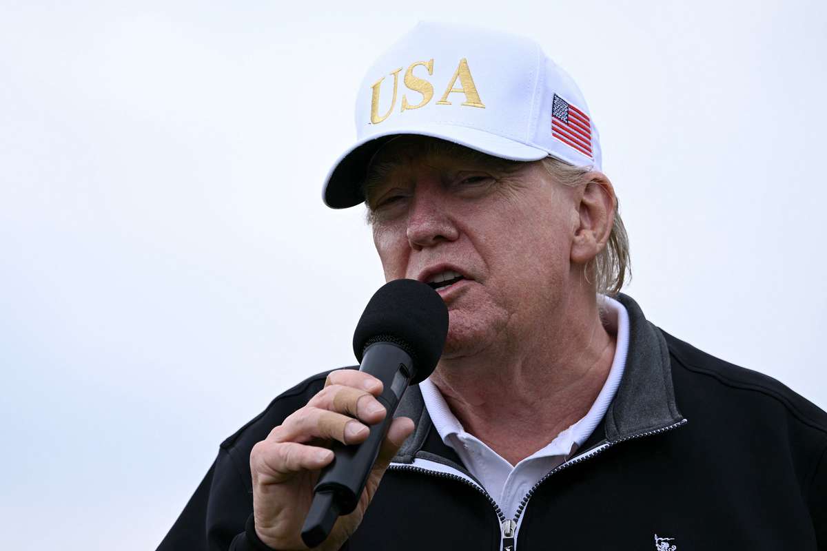 Course owner Donald Trump congratulates Grant Forrest's Scottish ...