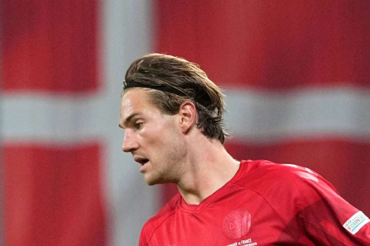 Hummel tone down jerseys and release black Denmark kit in Qatar World ...