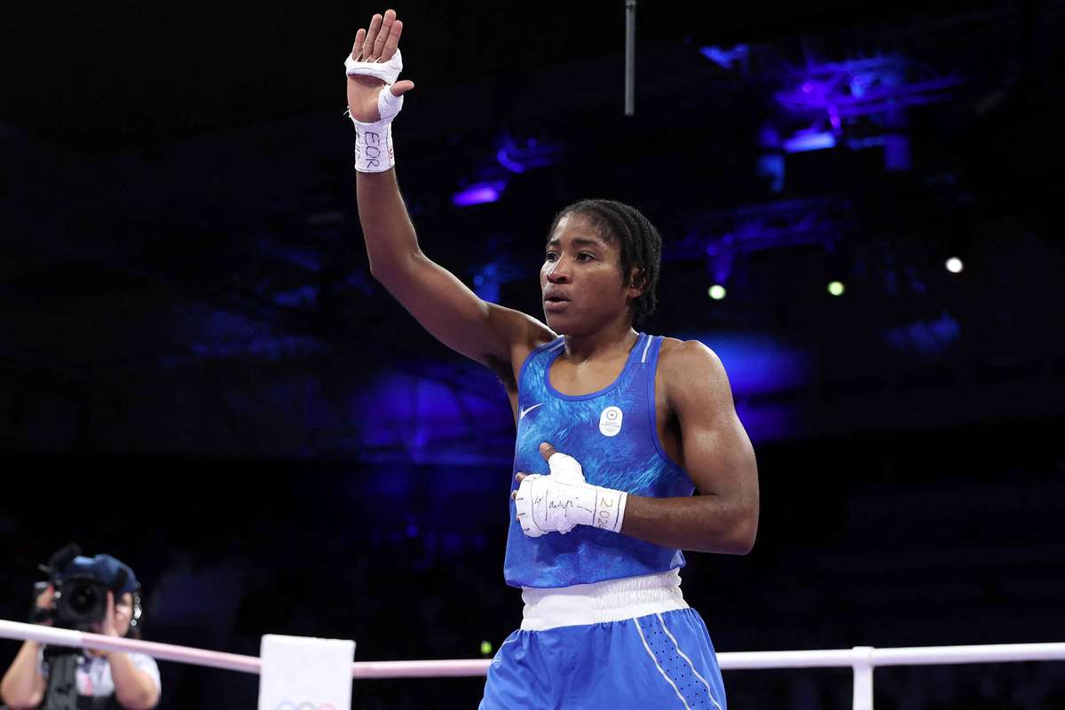 Refugee team boxer Ngamba one step from historic Olympic medal ...