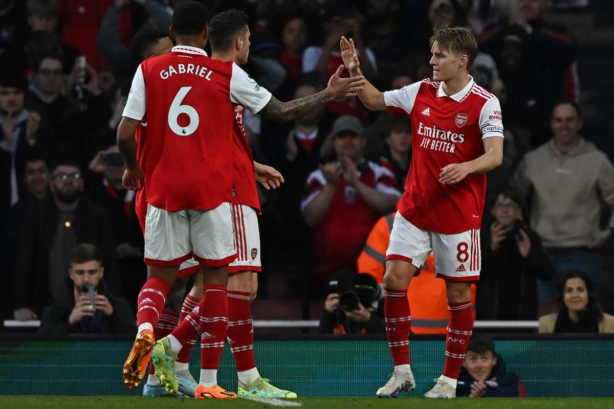 Arsenal return to Premier League summit after bruising Blues ...