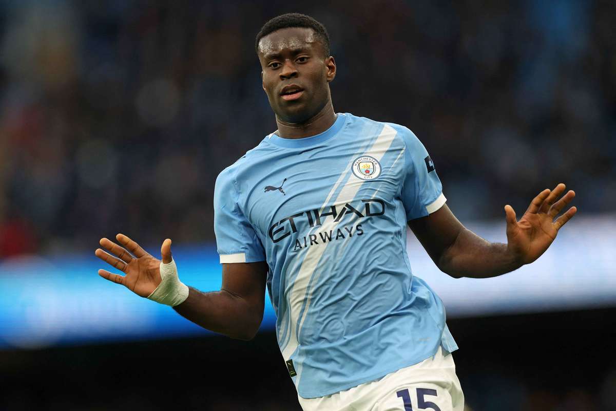 Man City ease past Wolves to close the gap on league leaders Arsenal ...