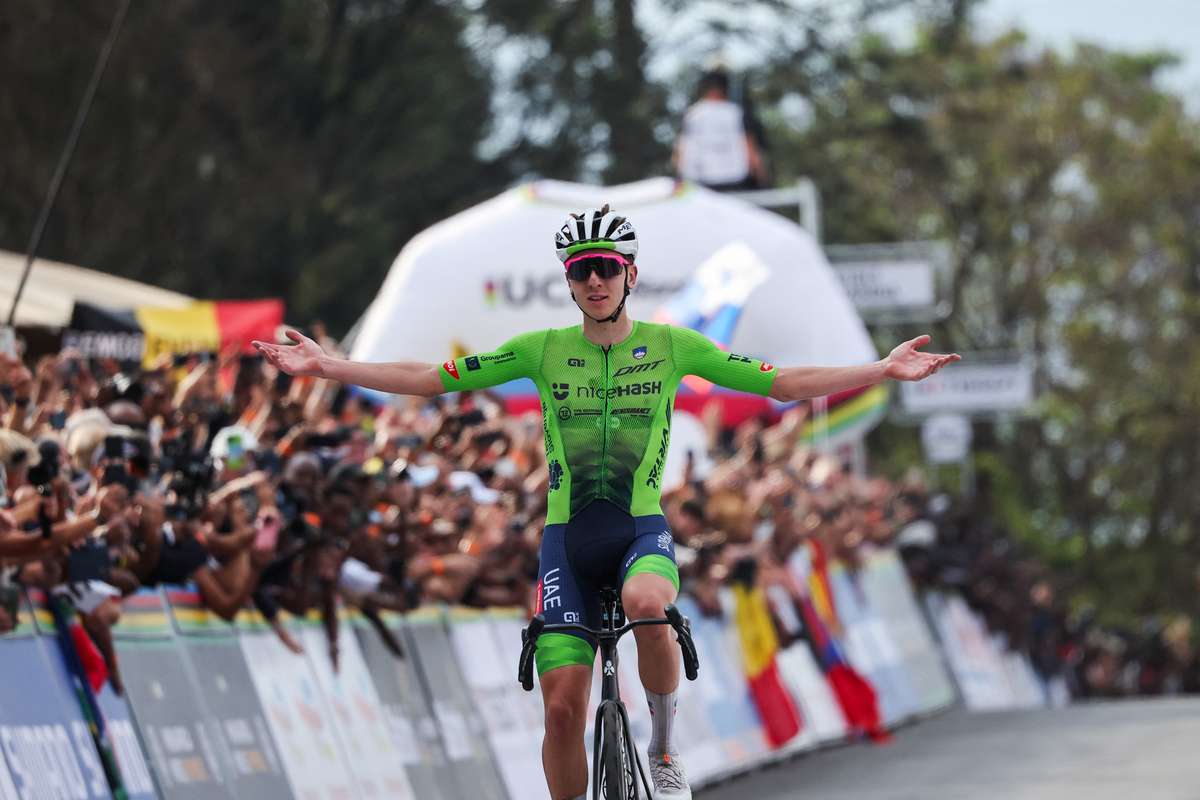 Invincible Tadej Pogacar retains world title after incredible solo ...