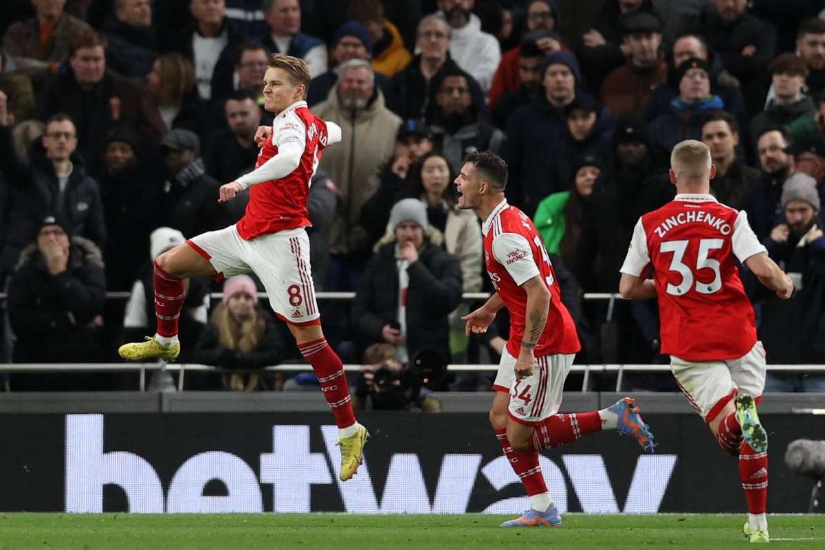 Arsenal open up eight point lead at the top of Premier League with ...