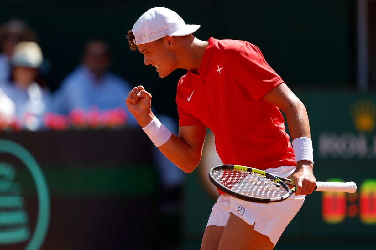 Holger Rune gets Denmark off to a perfect start in Davis Cup clash ...
