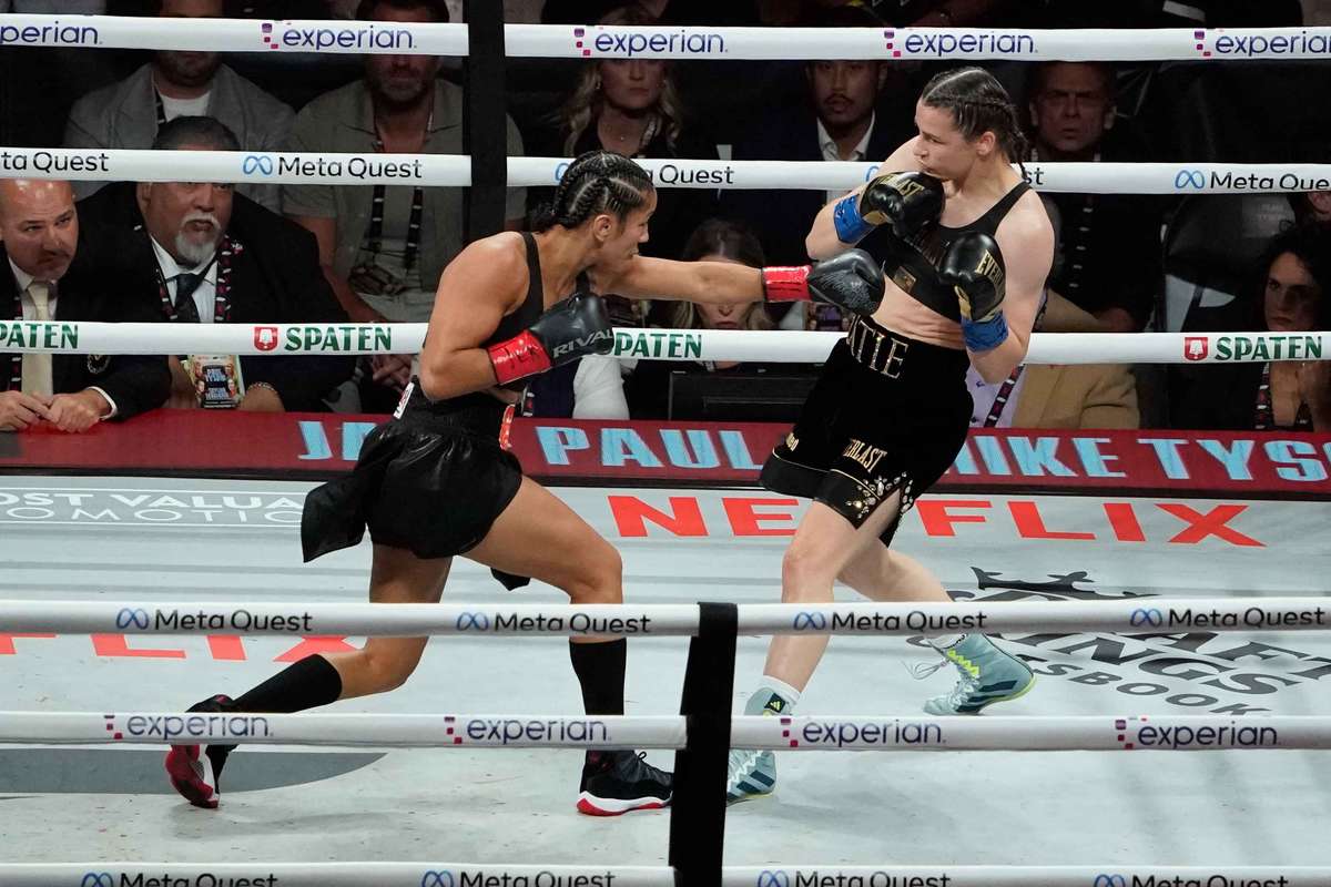 Taylor retains undisputed title despite controversial headbutt in ...