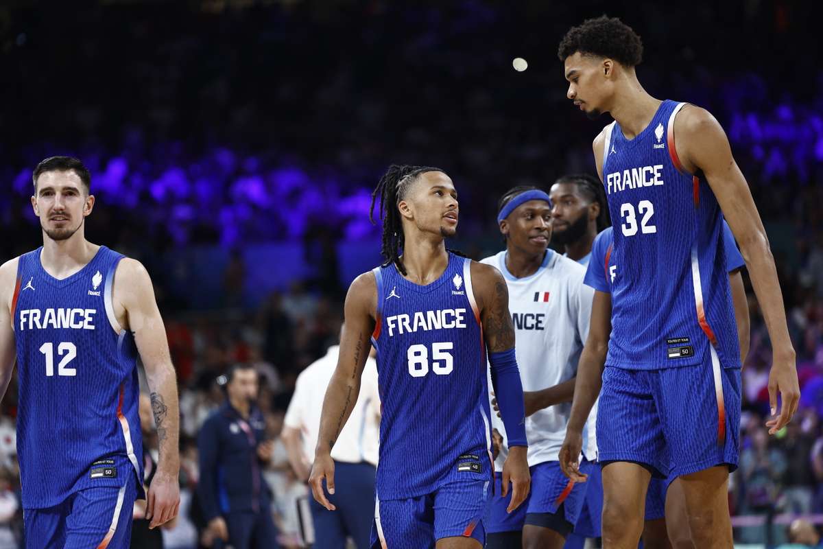 France reach Olympic basketball quarters after edging Japan ...