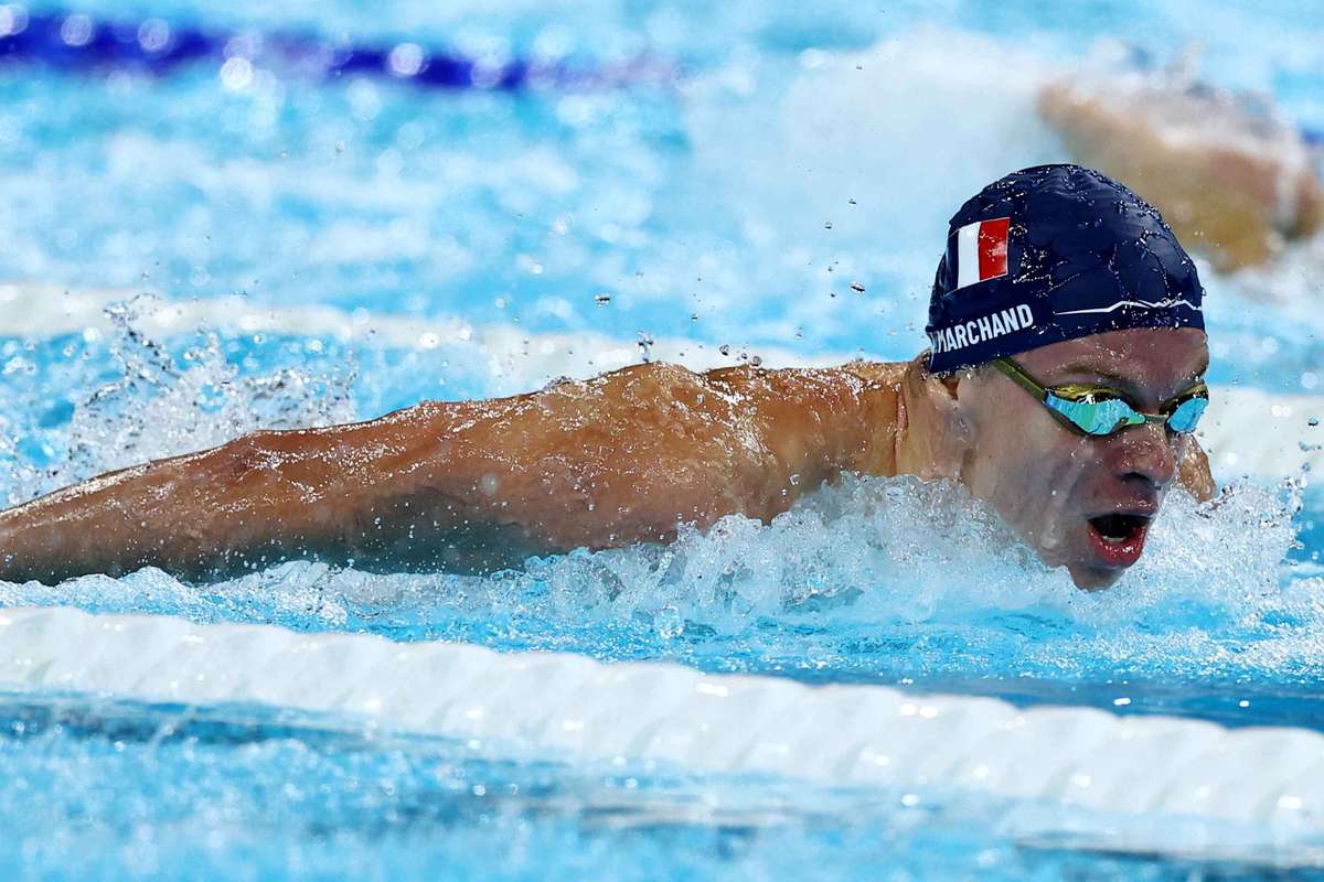 France's Leon Marchand takes 200 butterfly gold in Olympic record time ...