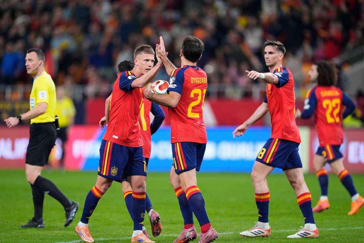 Spain confirm World Cup place with four-goal draw in stern test against ...