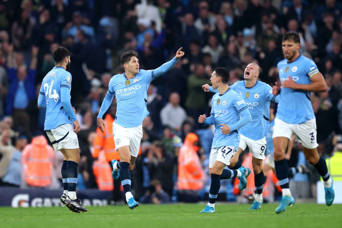 Stones the hero as Manchester City score late equaliser to break 10-man ...