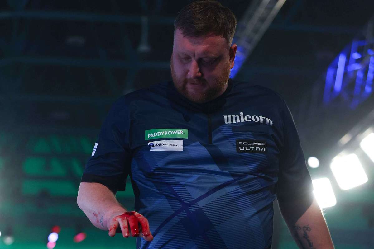 Menzies apologises for punching table in World Darts Championship exit ...