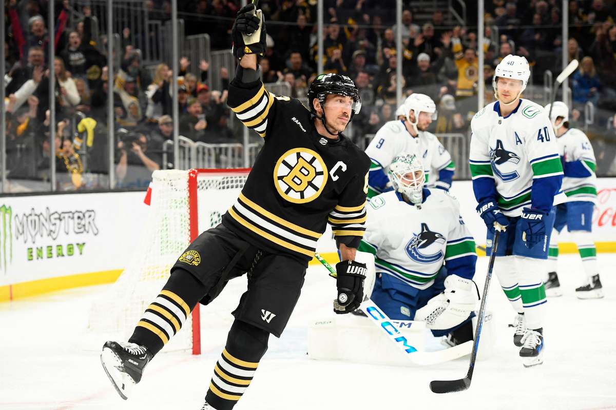 NHL roundup: Boston Bruins win showdown with Vancouver Canucks ...