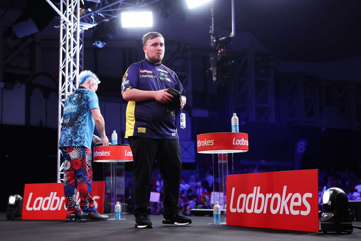 Littler advances at UK Darts Open after winning thriller against Wright ...