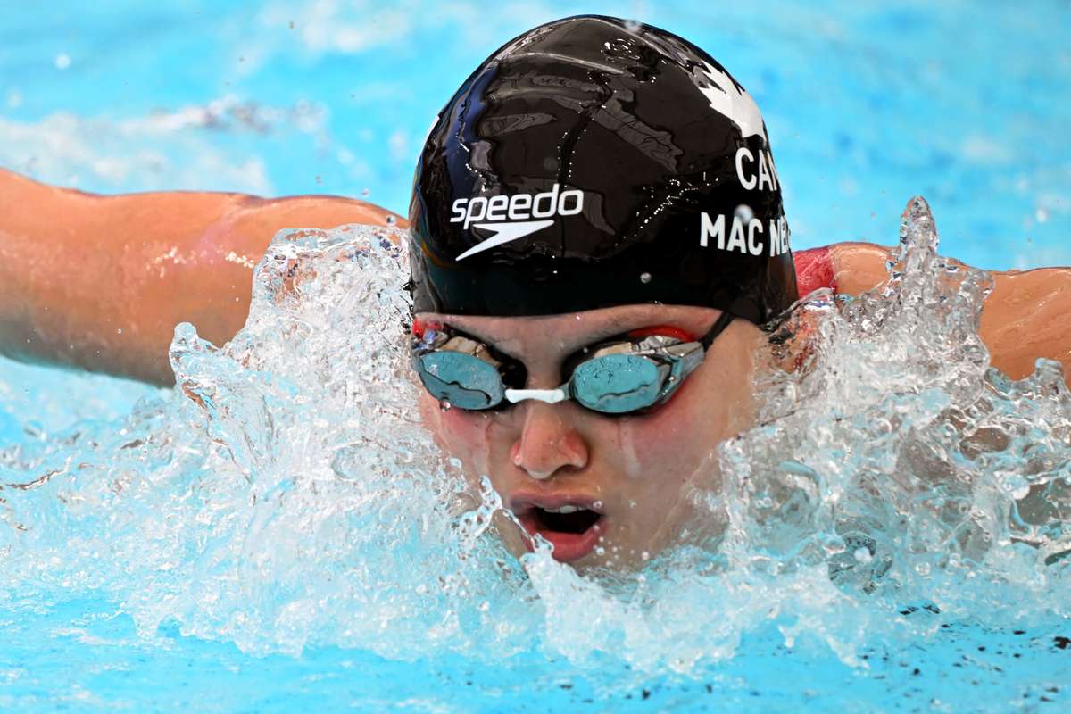 La canadiense Maggie MacNeil establece un nuevo récord de 100 metros ...