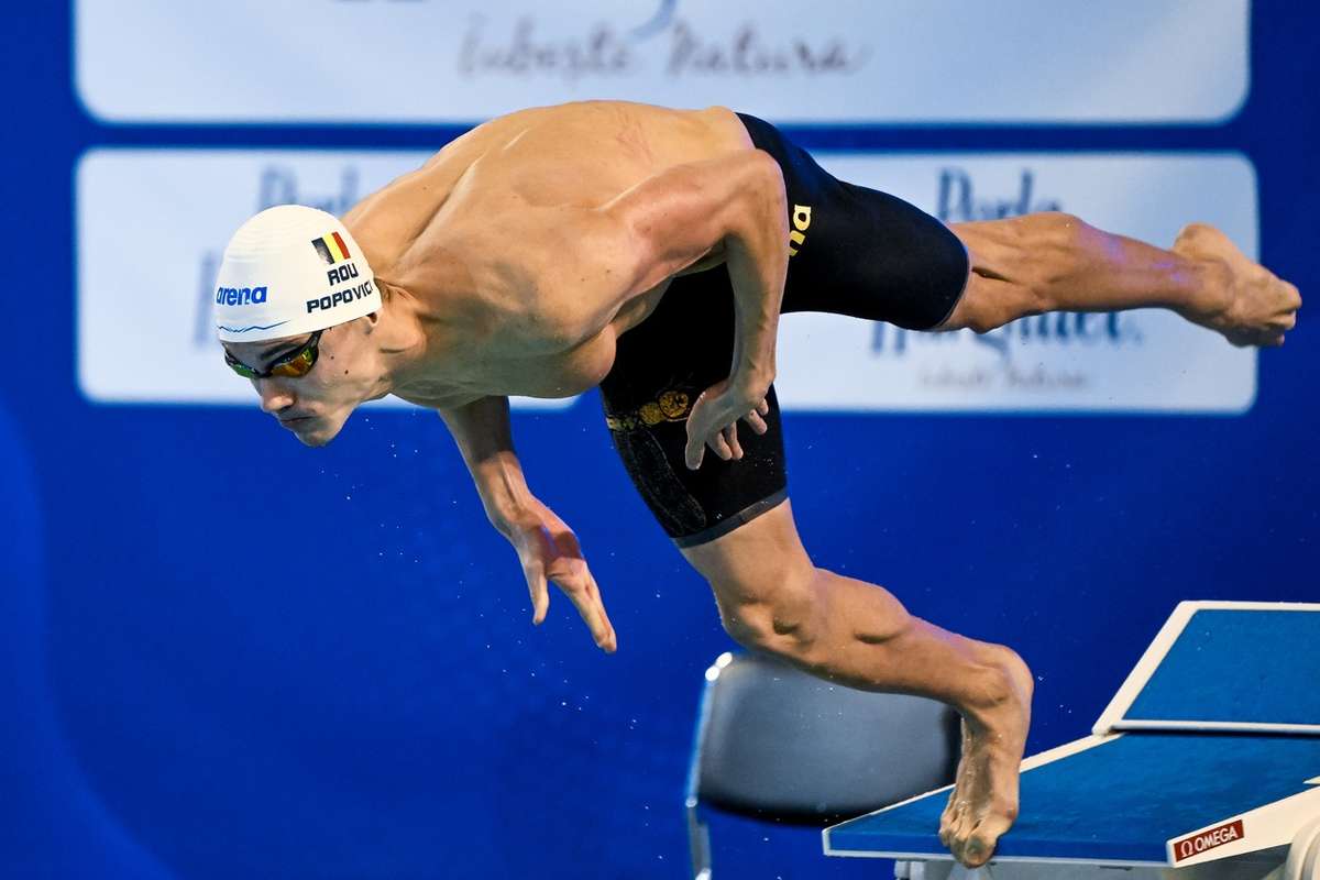 David Popovici, după ce a câștigat medalia de bronz în proba de 100 m ...