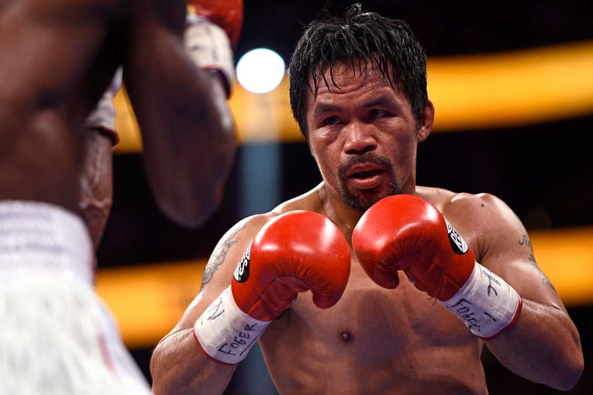 Manny Pacquiao confirms return to boxing with world title fight against ...